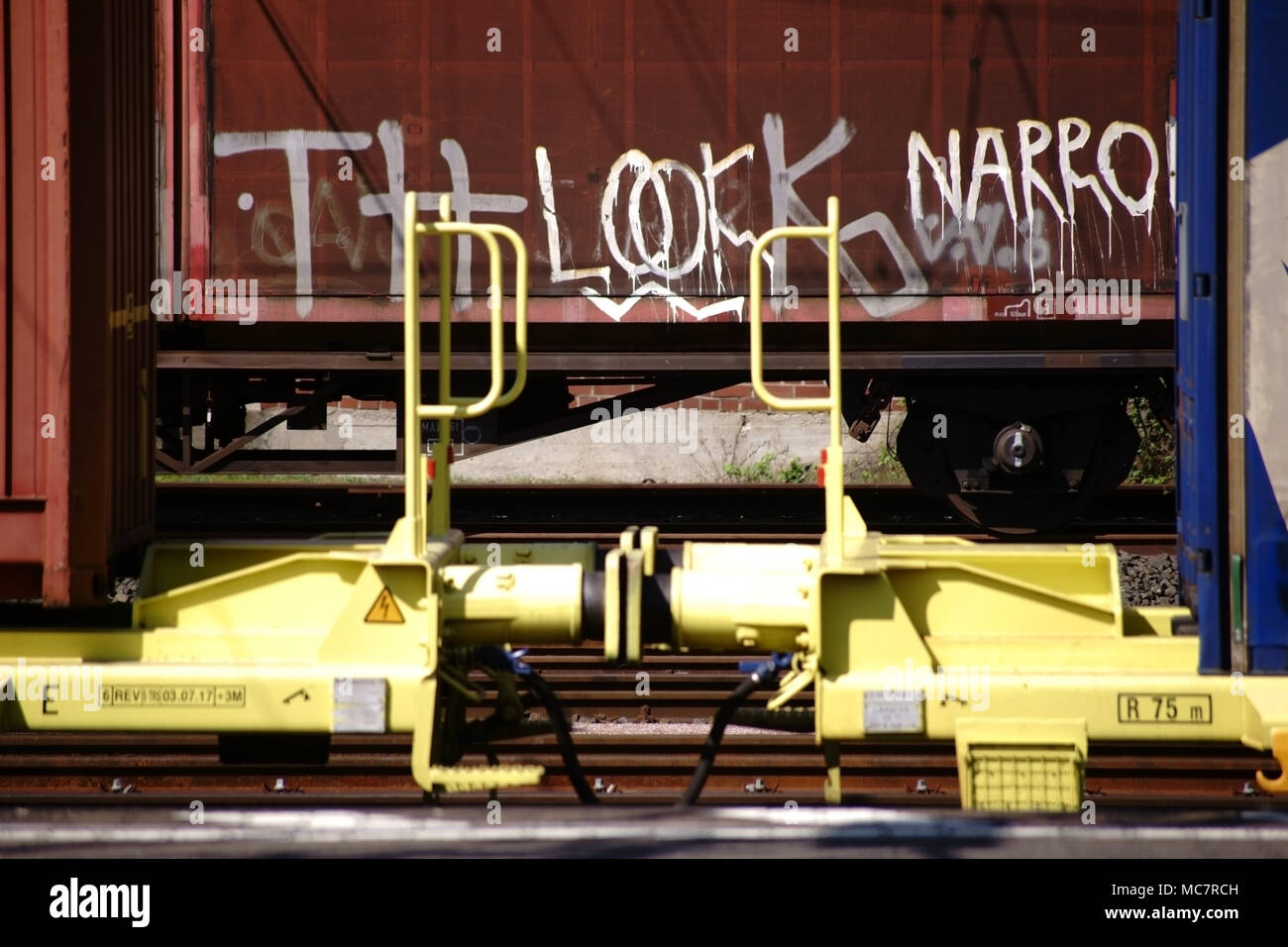 The outer body of a train with a tow-bar coupling of silencers and ...