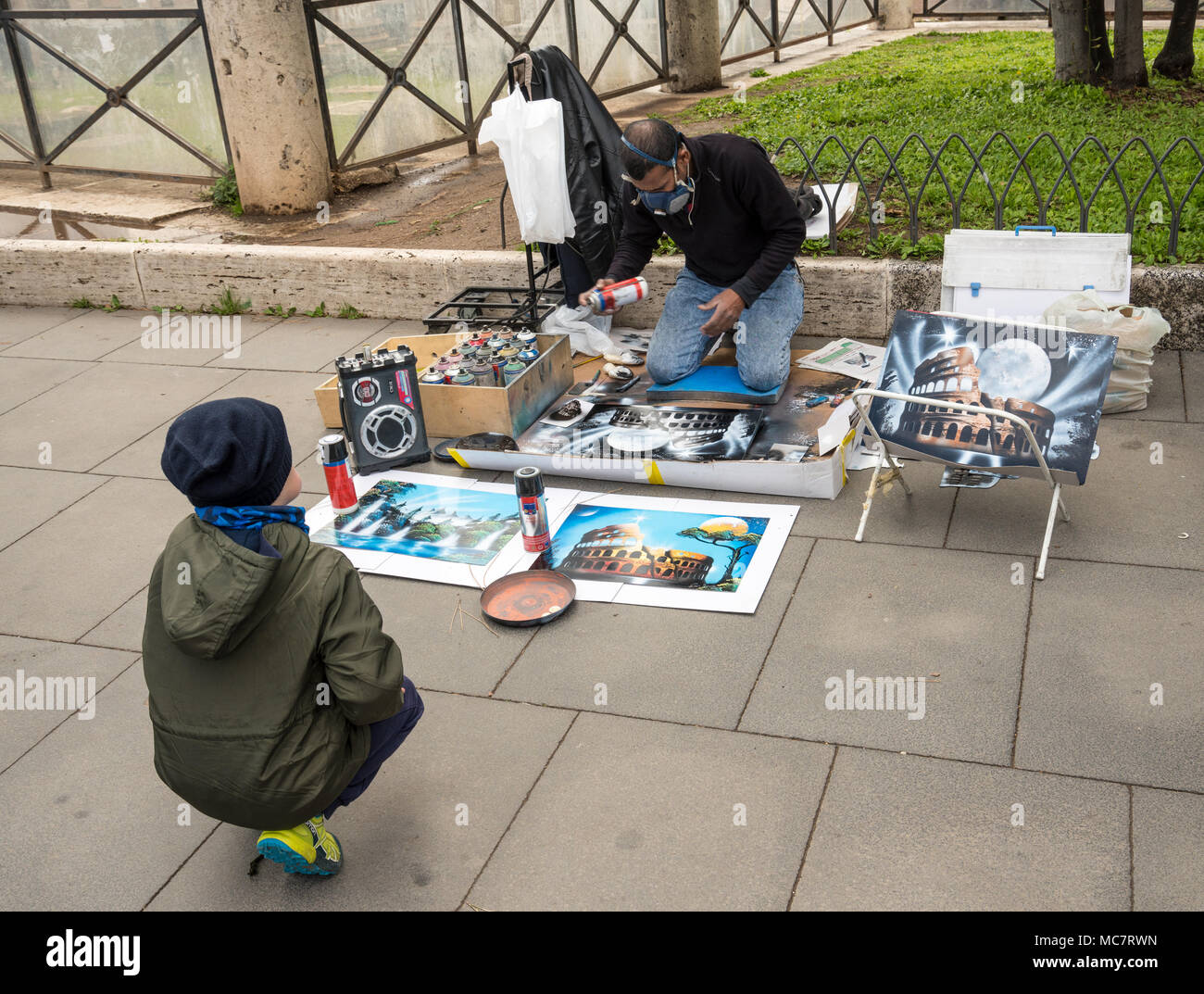 Artist creating paintings of Coliseum in Rome Stock Photo - Alamy