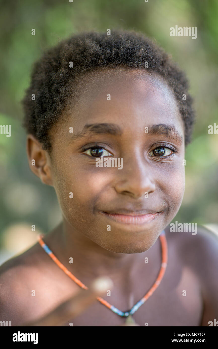 Portrait of a smiling Papuan young boy, Ambunti, Upper Sepik, Papua New ...
