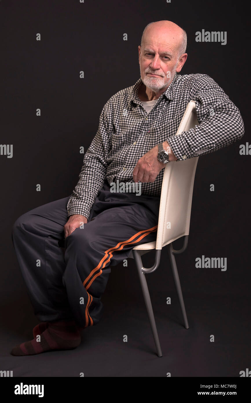 Self Portrait - Adrian Moss - Sitting - Full length Stock Photo - Alamy