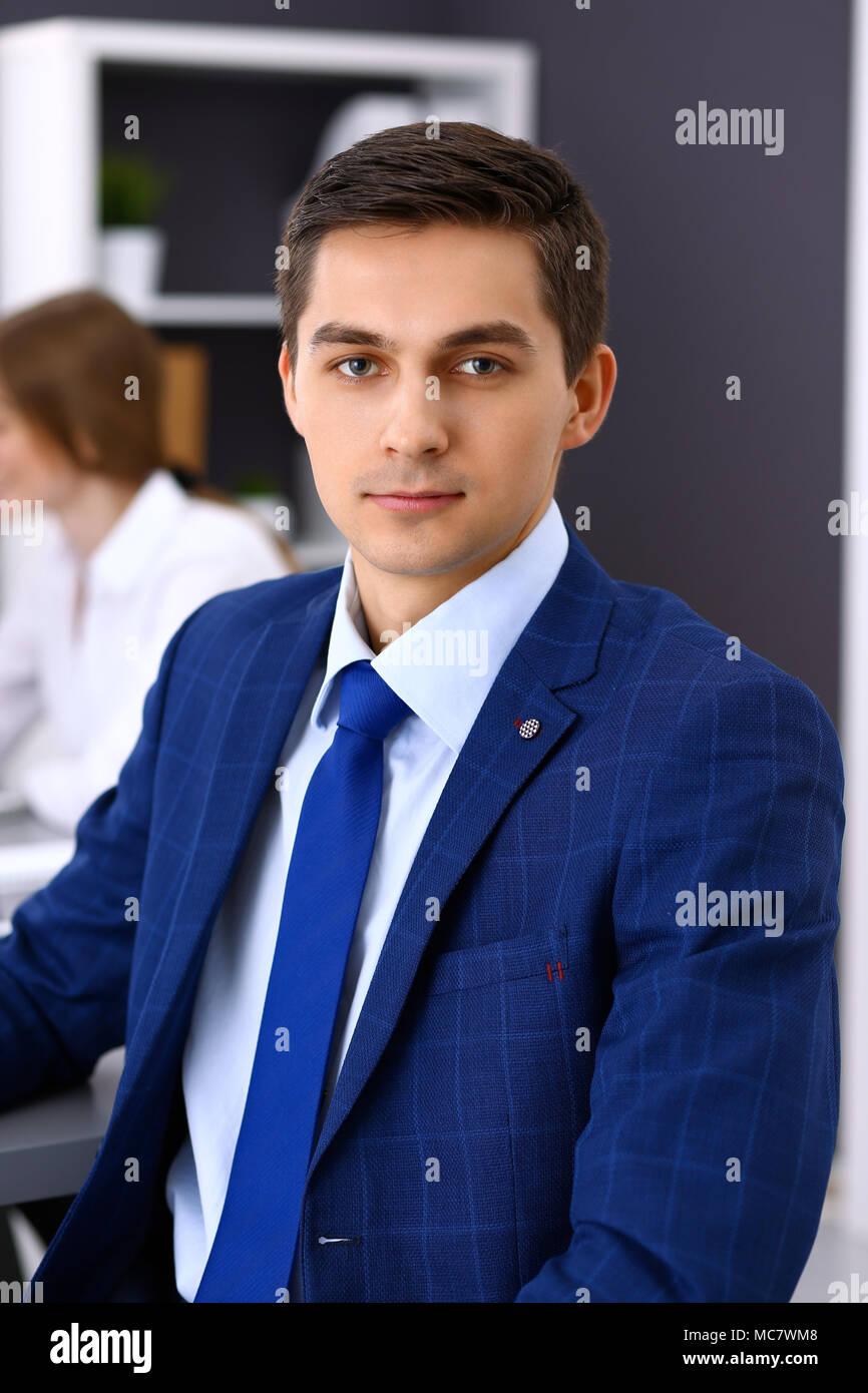 Group of business people at meeting on the background of office. Focus ...