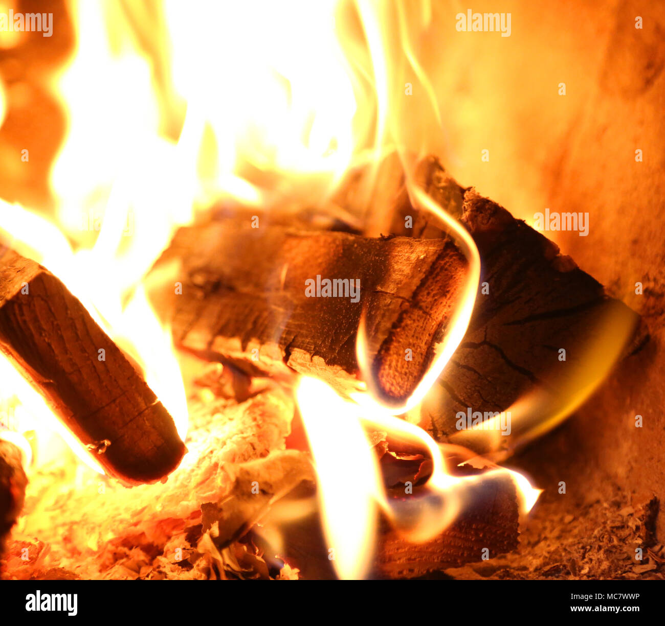 burnt pieces of wood with flames and fire Stock Photo - Alamy