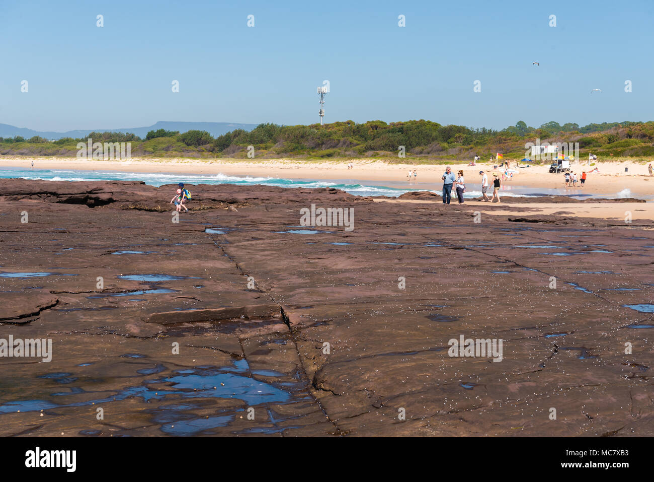 Shellharbour, NSW, Australia-March 30, 2018: People enjoying the sunny ...