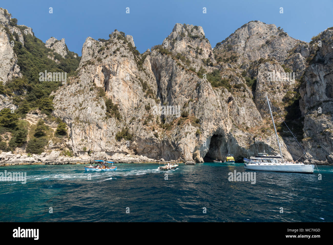 CAPRI, ITALY - JUNE 13, 2017: Boats with tourists near Grotta Bianca ...