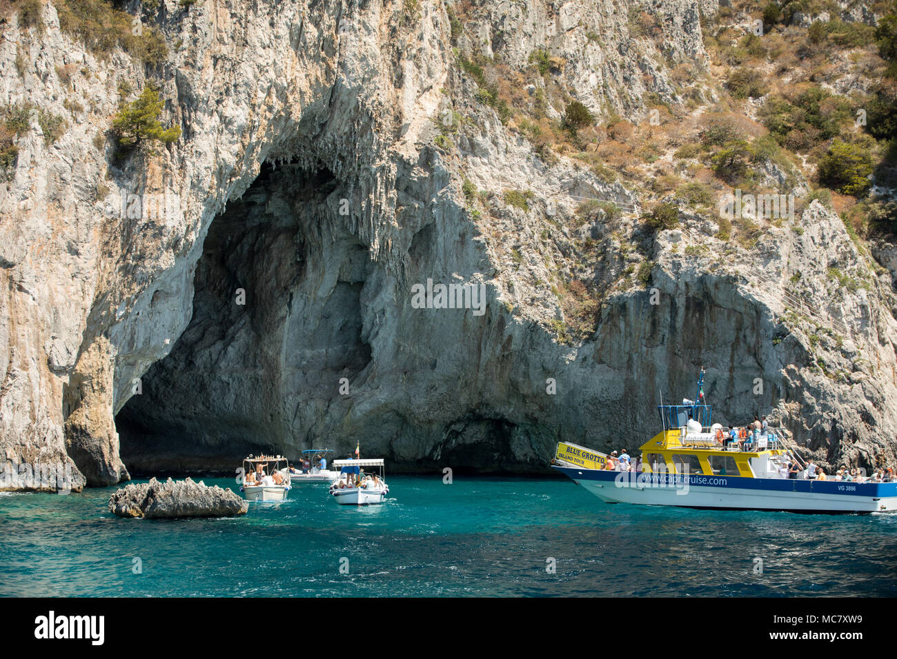 CAPRI, ITALY - JUNE 13, 2017: Boats with tourists near Grotta Bianca ...