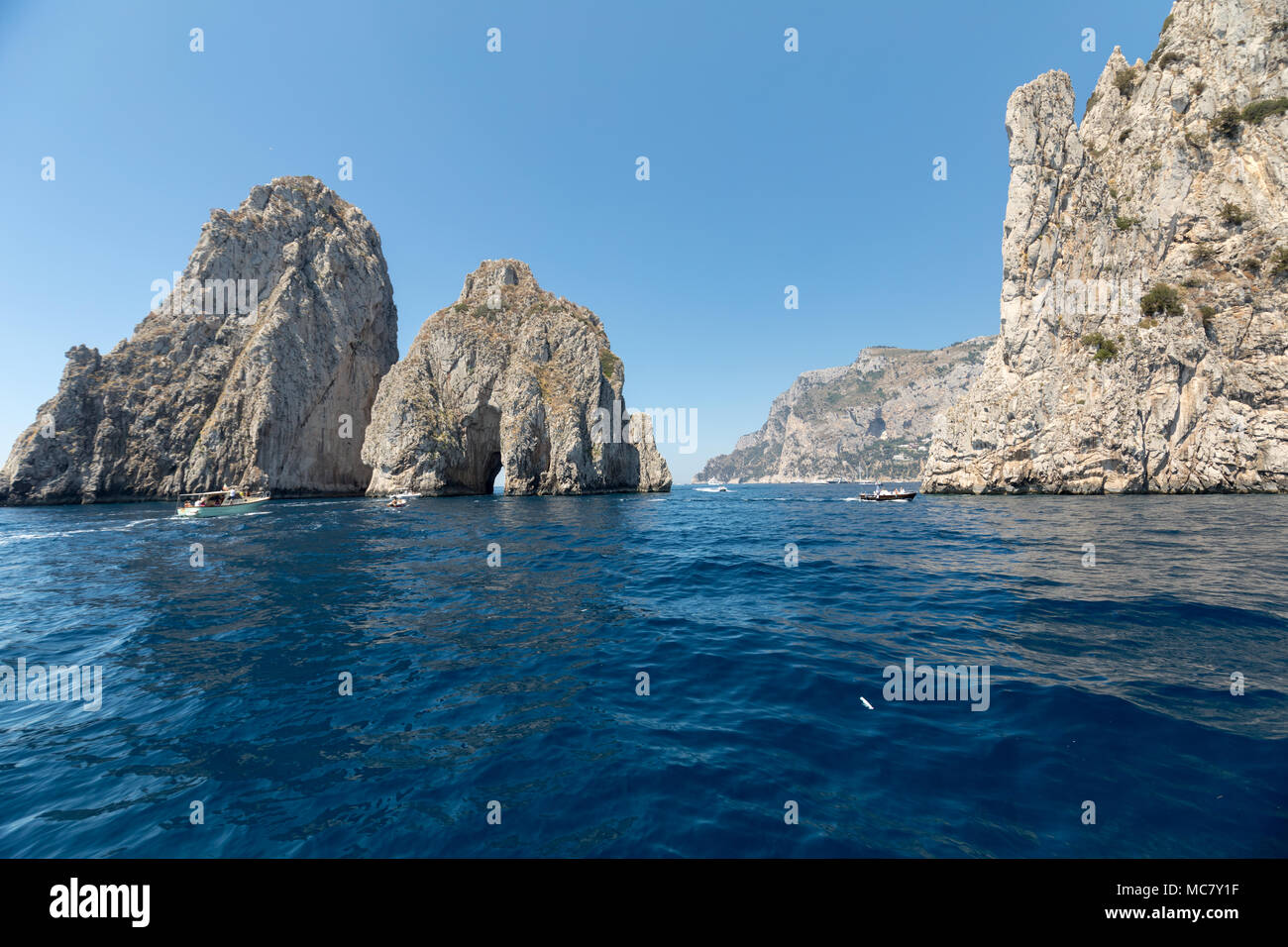 Faraglioni Rocks on Capri Island, Italy. Rock's names left to left ...