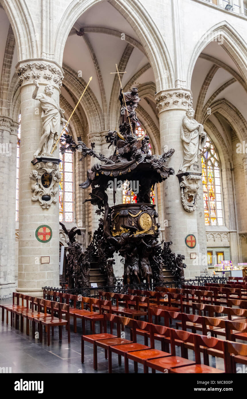 Wood pulpit in Saint Michael cathedral in Brussels. Impressive art work ...