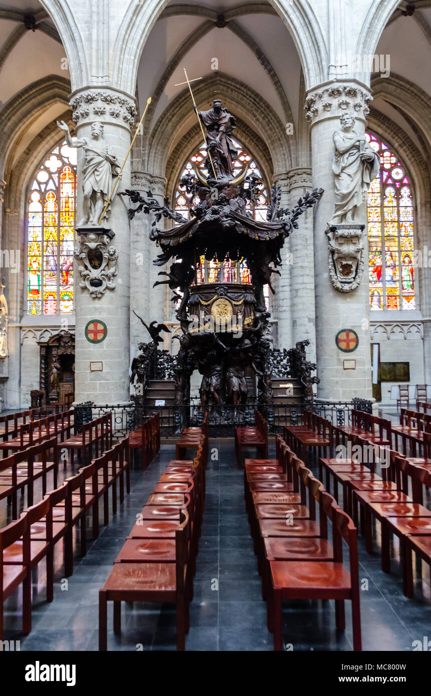 Wood pulpit in Saint Michael cathedral in Brussels. Impressive art work ...
