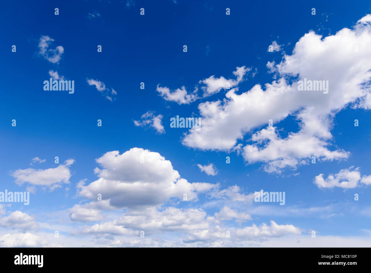 Sunny blue sky with clouds in spring time Stock Photo - Alamy