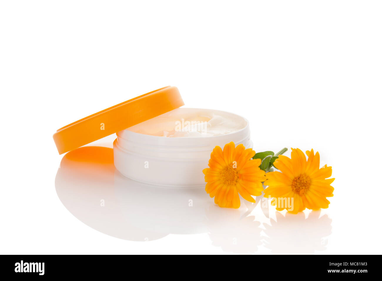 Healthy medical cream with marigold extract isolated on white ...