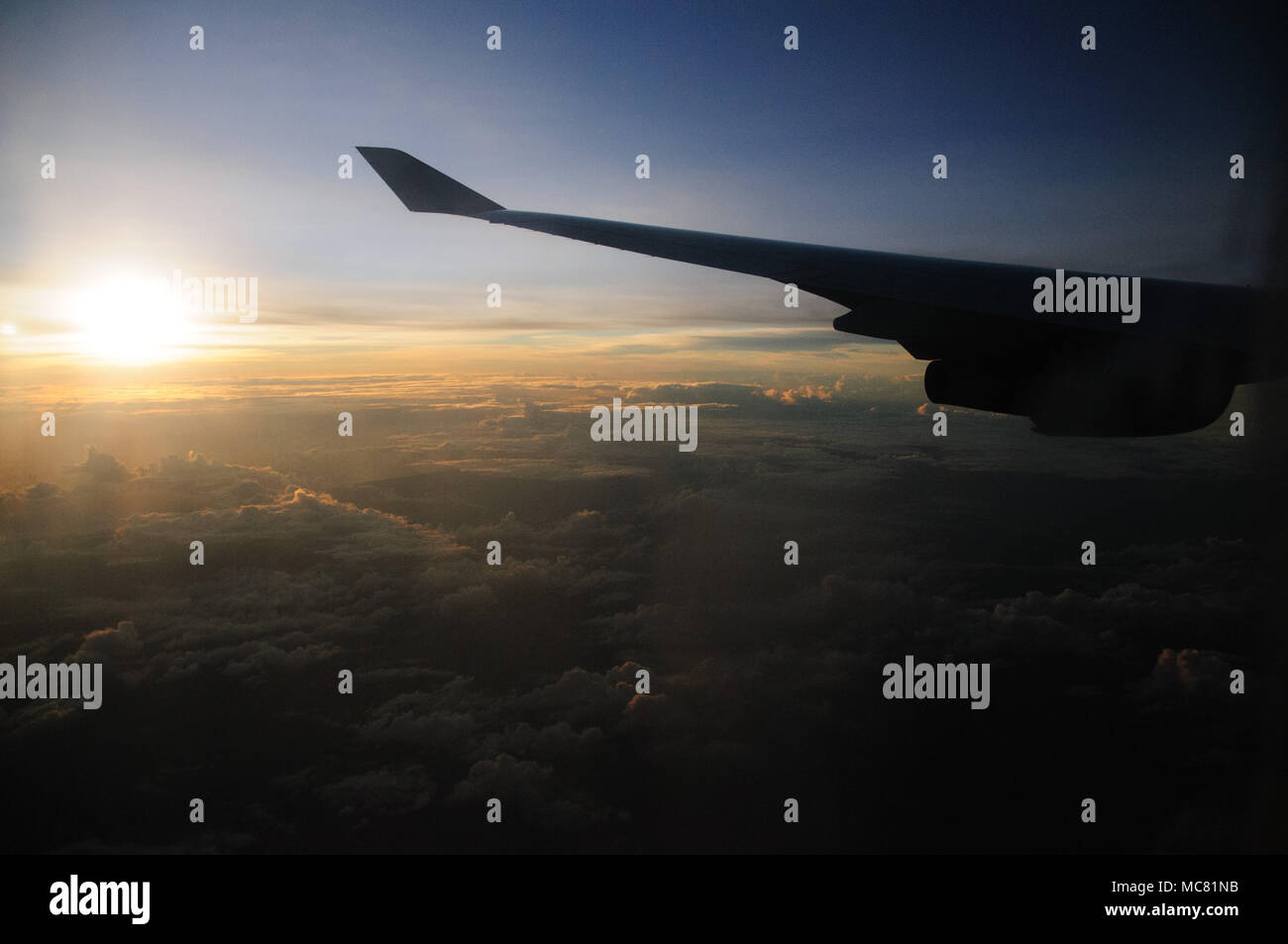 Sun rise over Brazil from the seat of an aircraft Stock Photo - Alamy