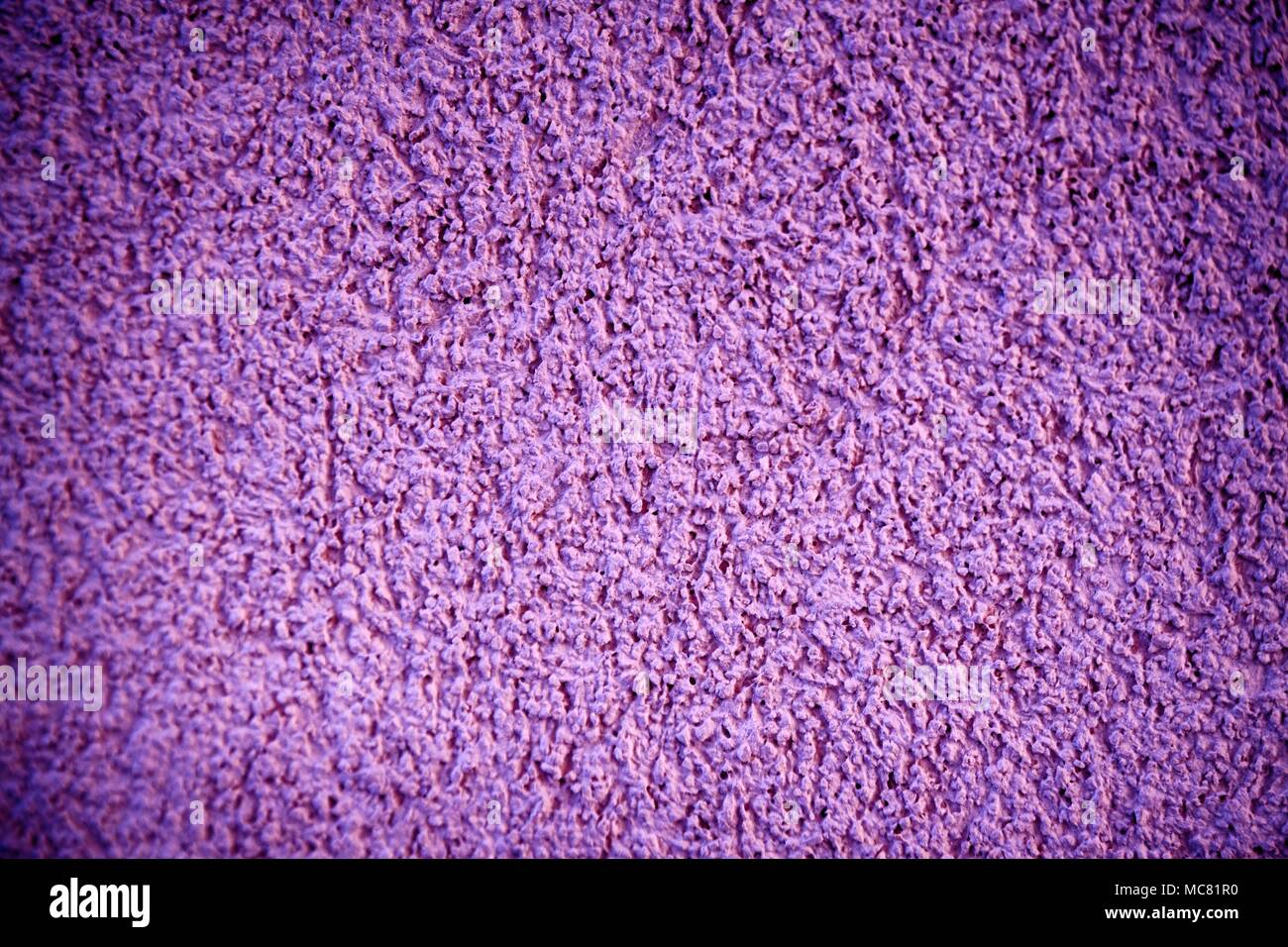Decorative Ultra purple plaster texture on the wall - art brush stroke ...