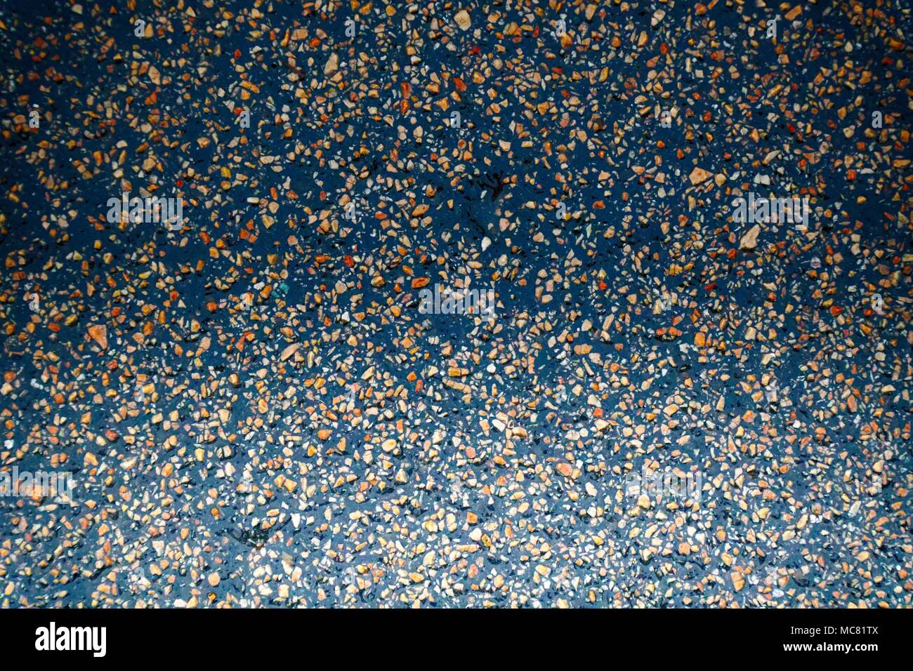 Texture of black rubber floor on playground. ( Ethylene Propylene Diene ...