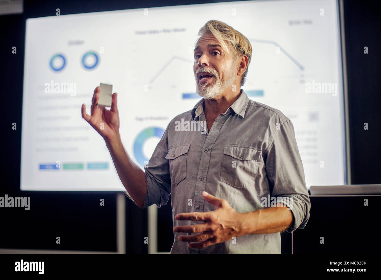 Man giving presentation Stock Photo - Alamy