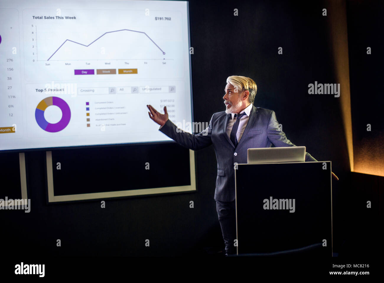 Man giving presentation Stock Photo - Alamy