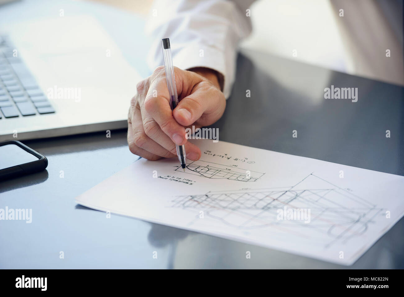 Man working with blueprints Stock Photo - Alamy