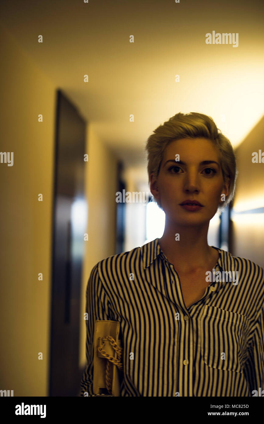 Carrying under arms hi-res stock photography and images - Alamy