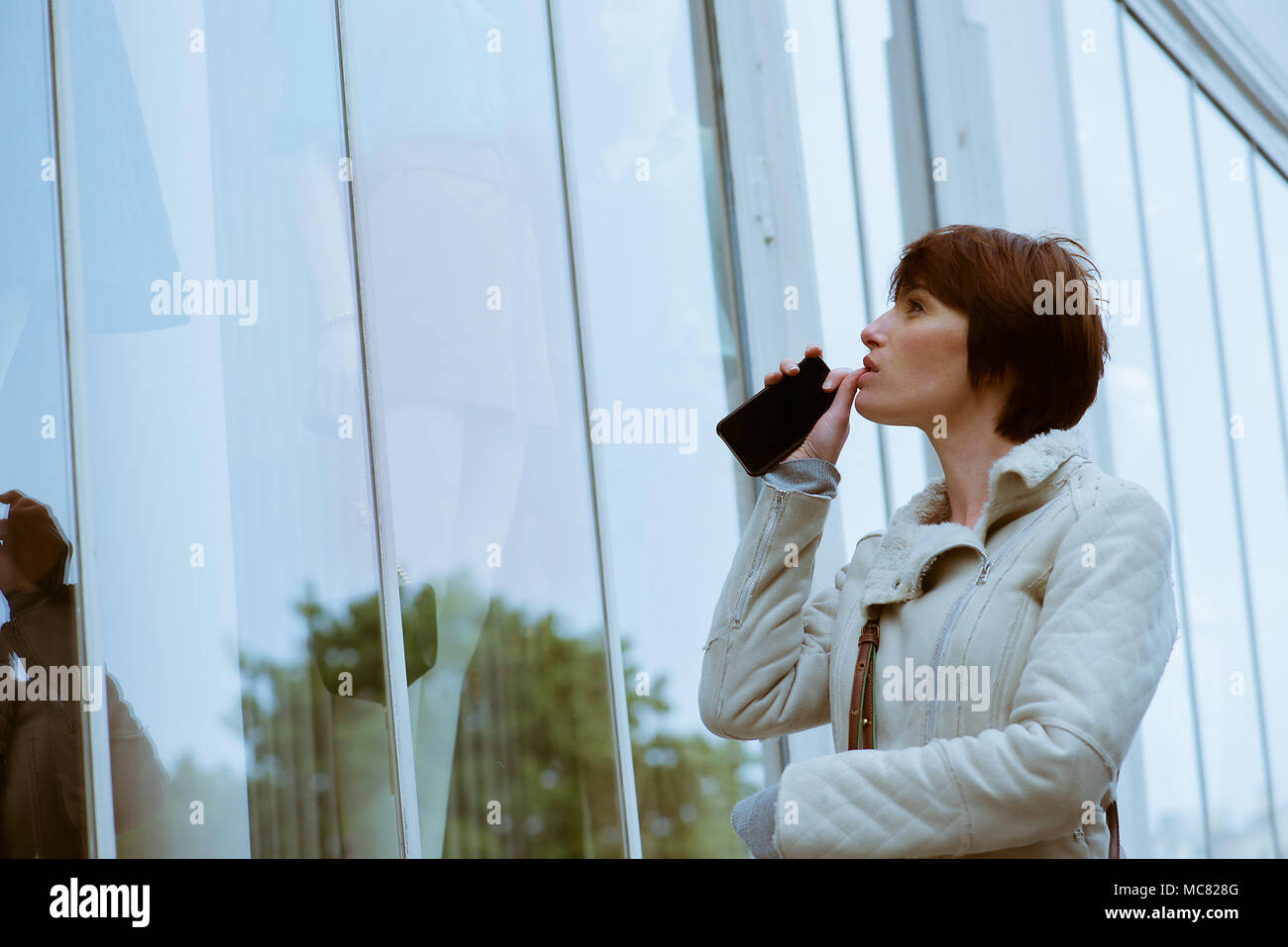 Person looking shop windows hi-res stock photography and images - Alamy