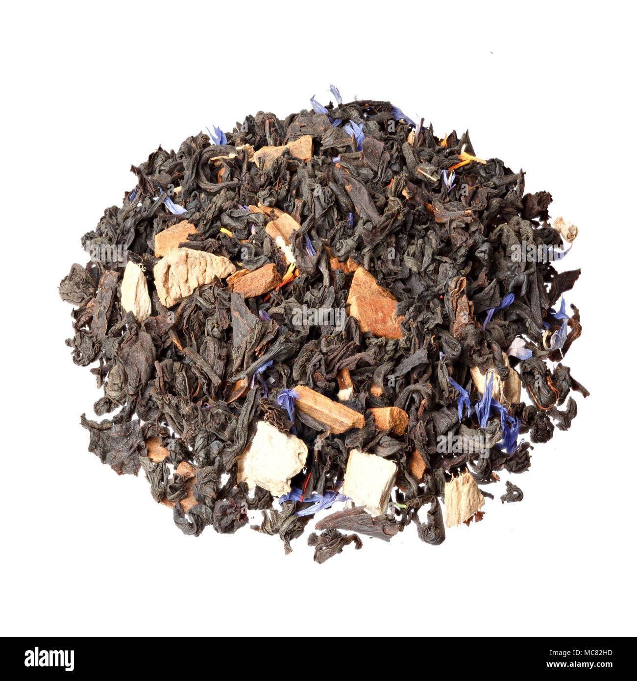Tea mix of cubes of dried ginger, safflower and cornflower petal Stock ...