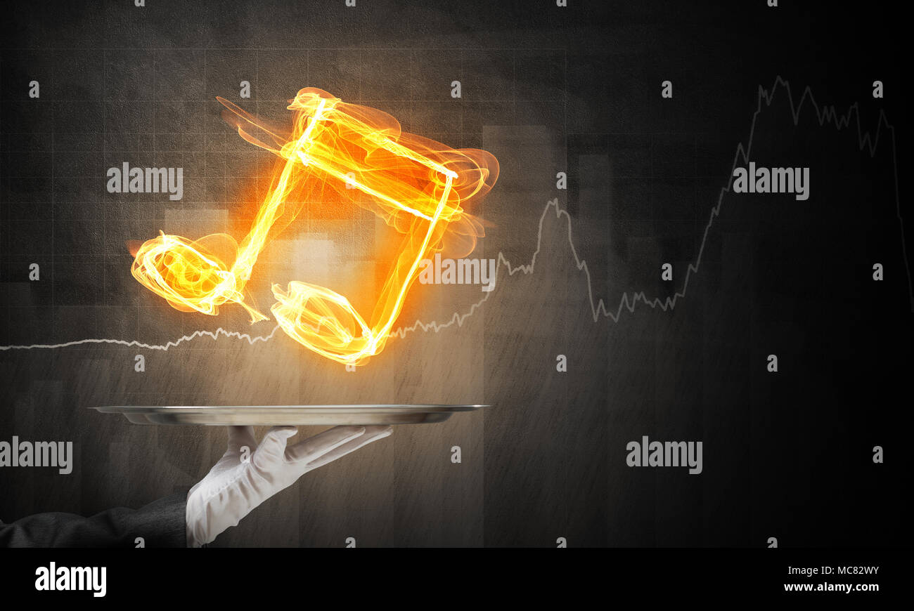 Hand of waitress presenting musical concept Stock Photo - Alamy