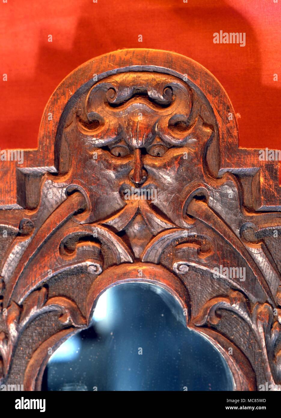 Wooden carving (mirror frame) of floriate horned goat (the Sabbatic ...