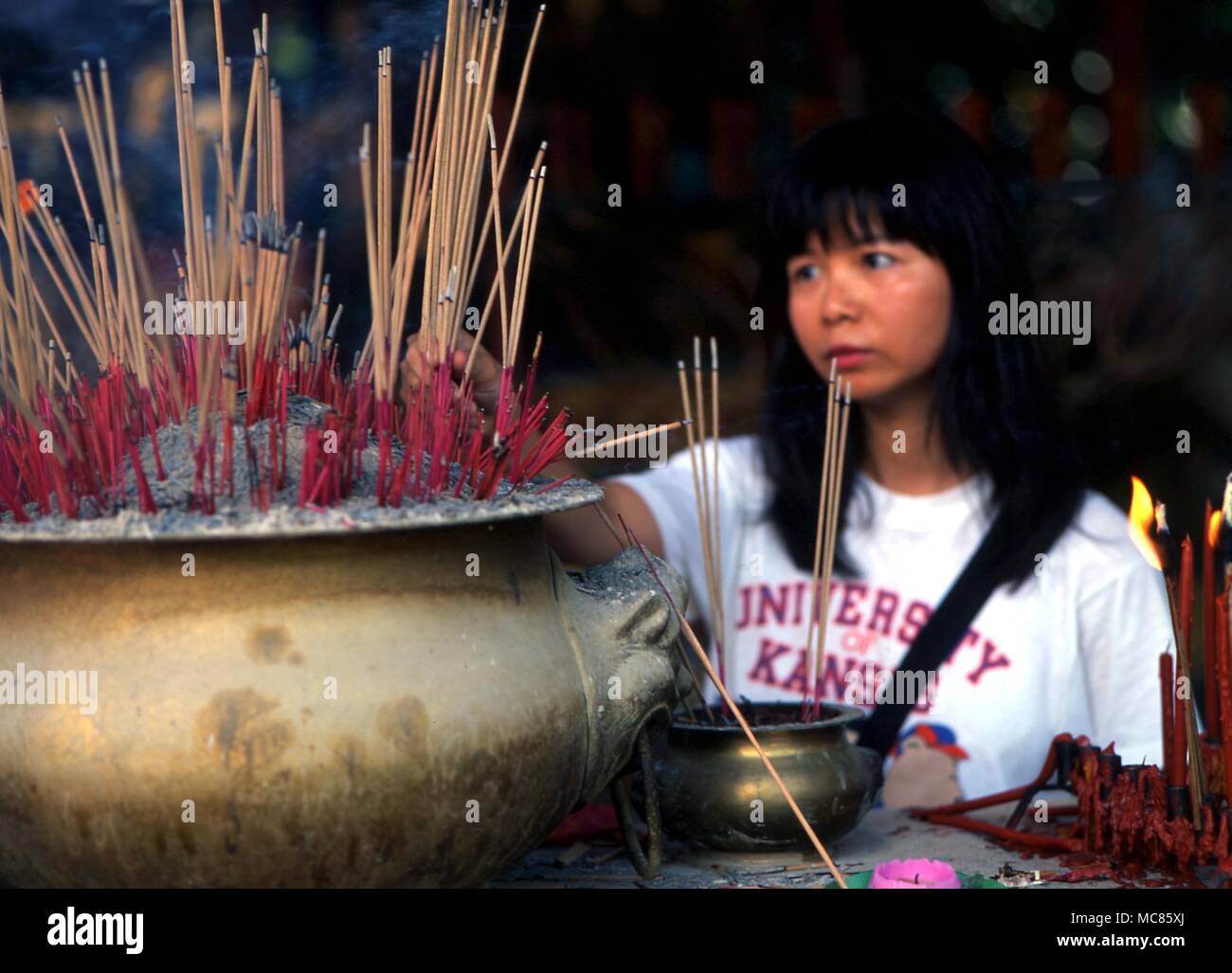 INCENSE Burning incense in a Buddhist Temple, Penang Stock Photo - Alamy