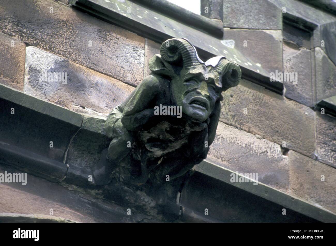 GARGOYLE Demonic gargoyle on the south wall of the parish church ...