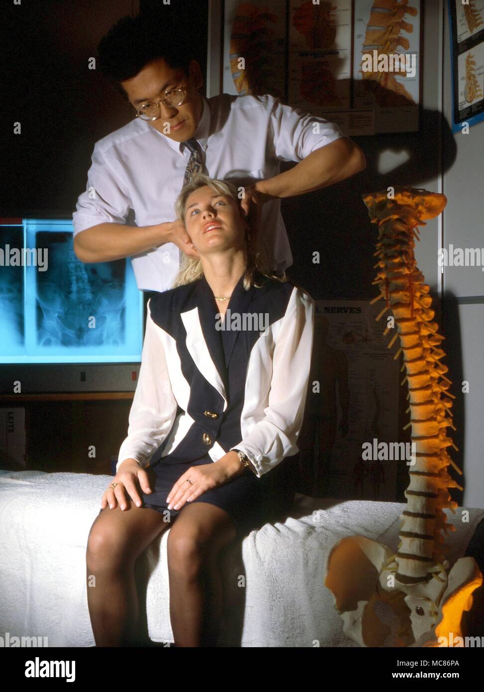 CHIROPRACTICE The chiropractor, Paul Cheung, demonstrating his art ...