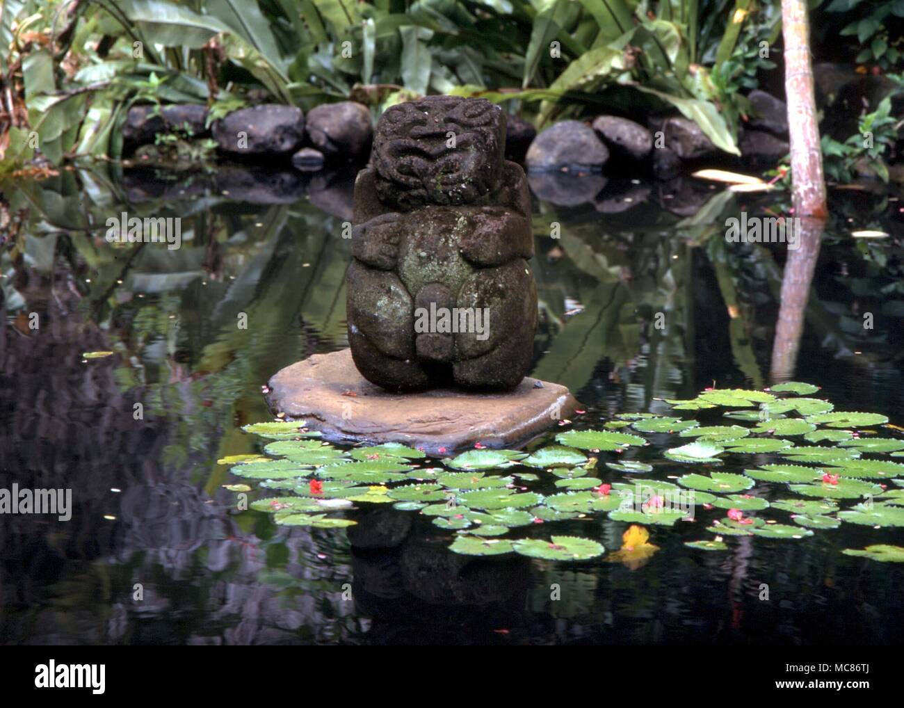 POLYNESIAN MYTHOLOGY Magical Polynesian statue set in a pond on the ...