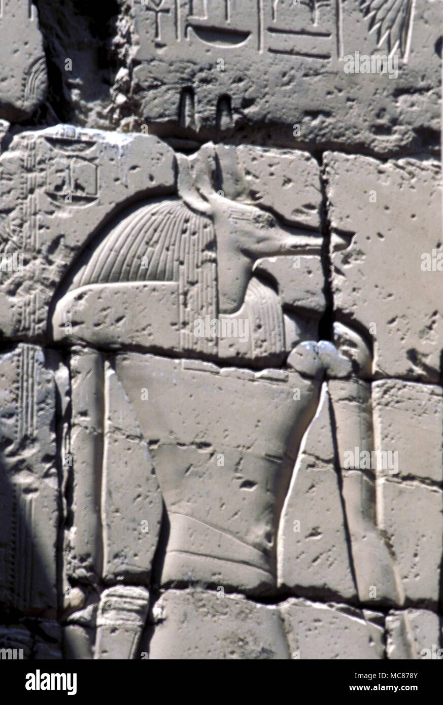 EGYPTIAN MYTHOLOGY - ANUBIS Bas relief of the jackal-headed god, Anubis, on the outer walls of ...