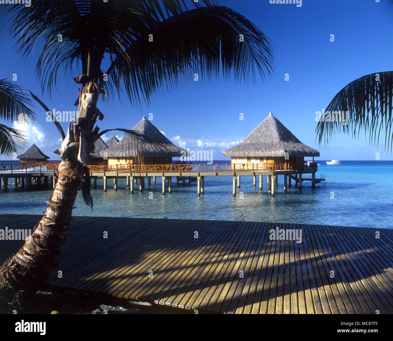 TROPICAL ISLANDS French Polynesia. Beach at Rangiroa. tourist complex ...