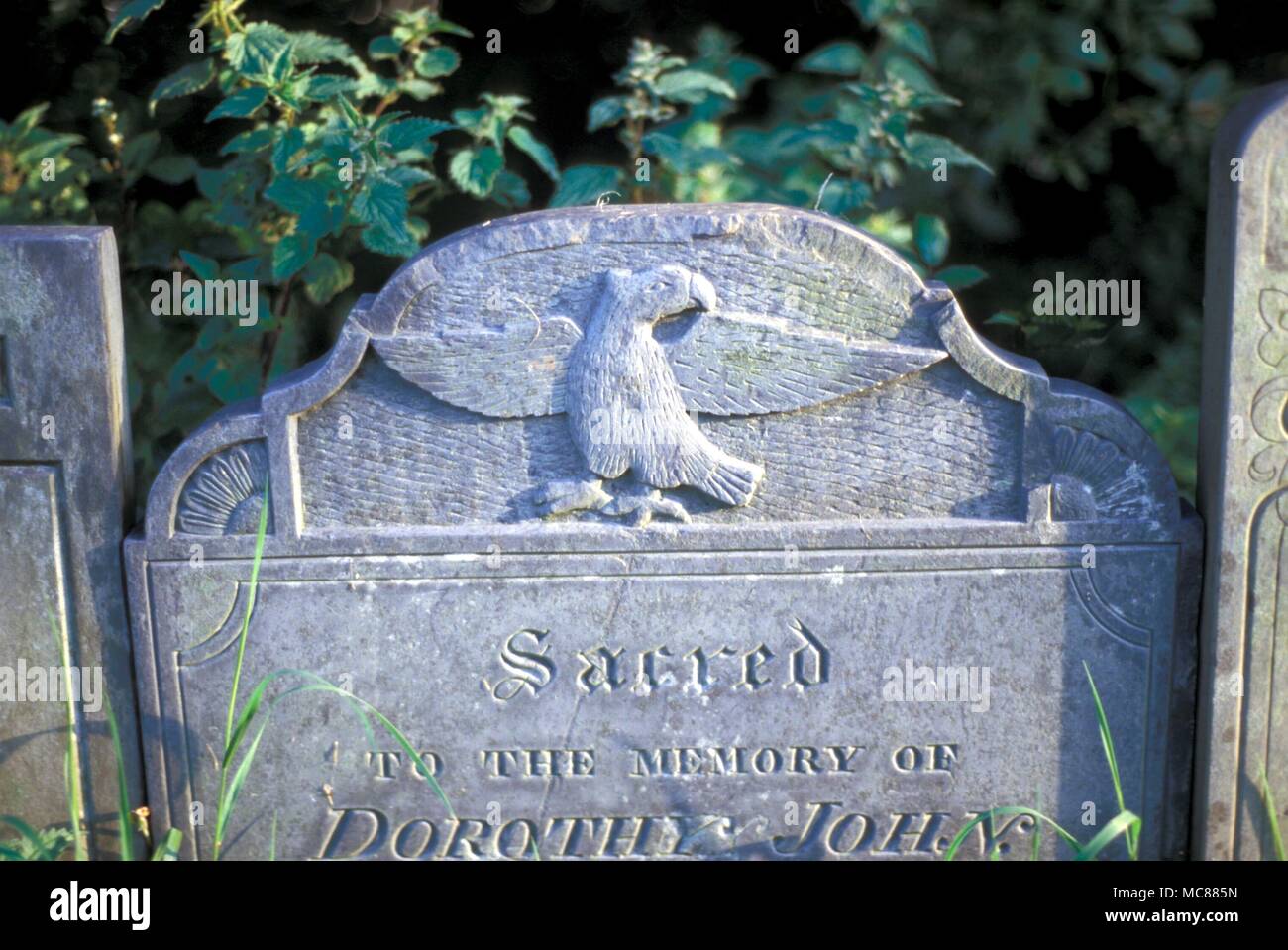 GRAVEYARD Fishguard. symbol on stone Stock Photo - Alamy
