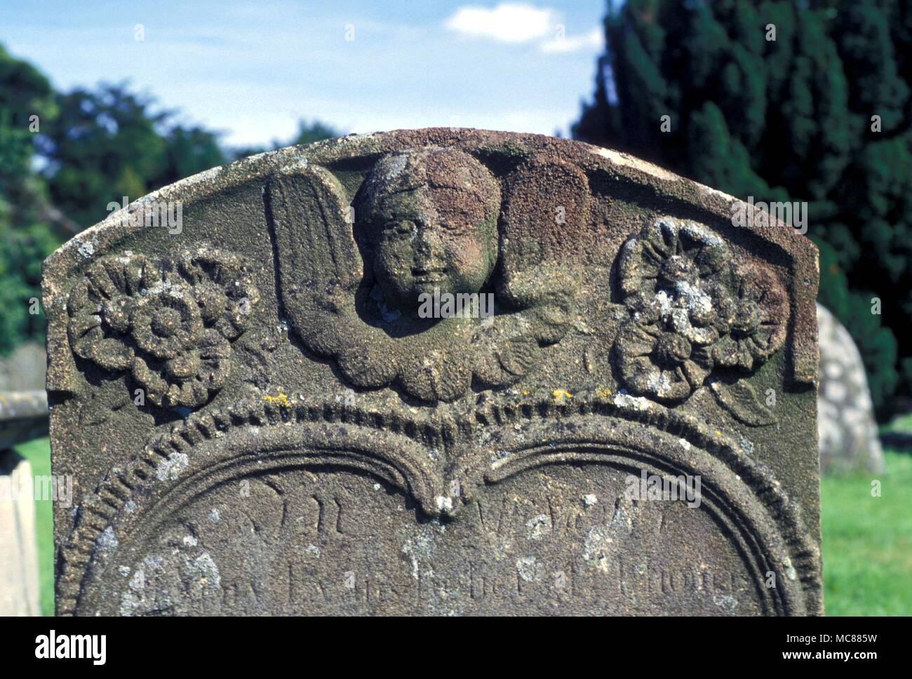 GRAVEYARD symbols - symbolic heads on a gravestone in Staunton Stock ...