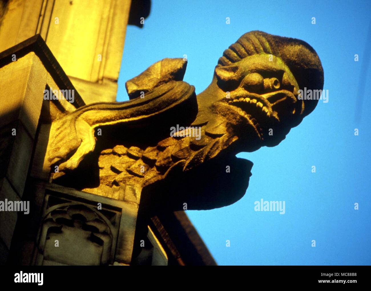 GARGOYLE Demonic gargoyle on the exterior wall of Manchester Cathedral ...