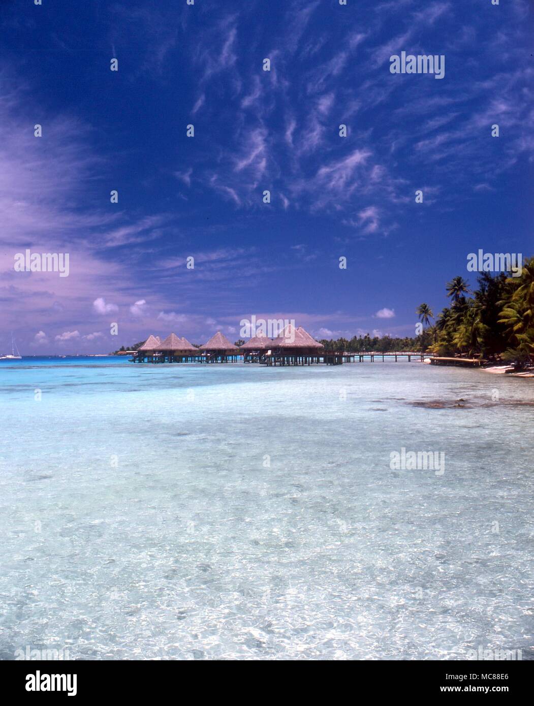 TROPICAL ISLANDS French Polynesia. Beach at Rangiroa. Tourist complex ...
