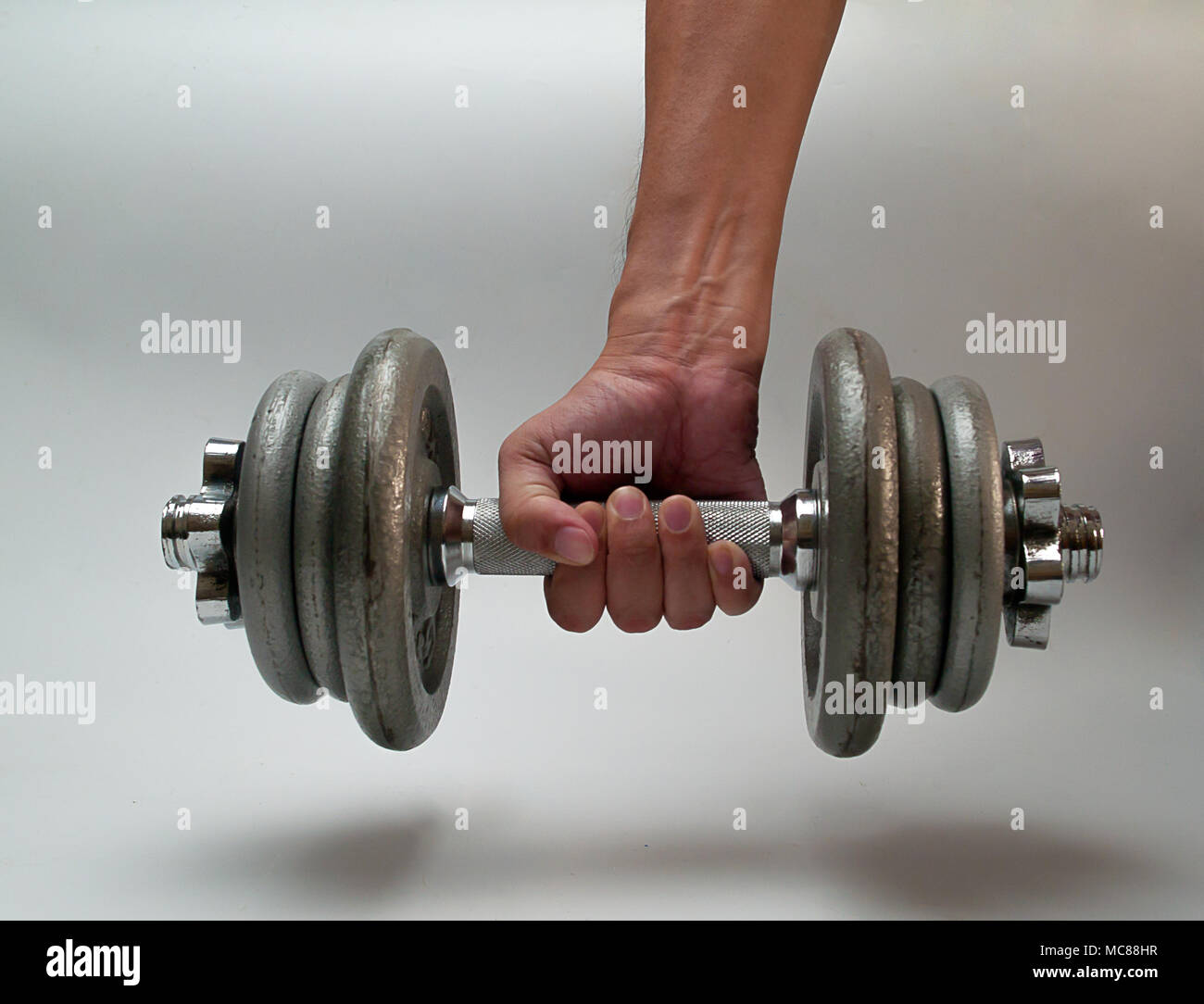 Weight-lifting ,Exercise to health Stock Photo - Alamy