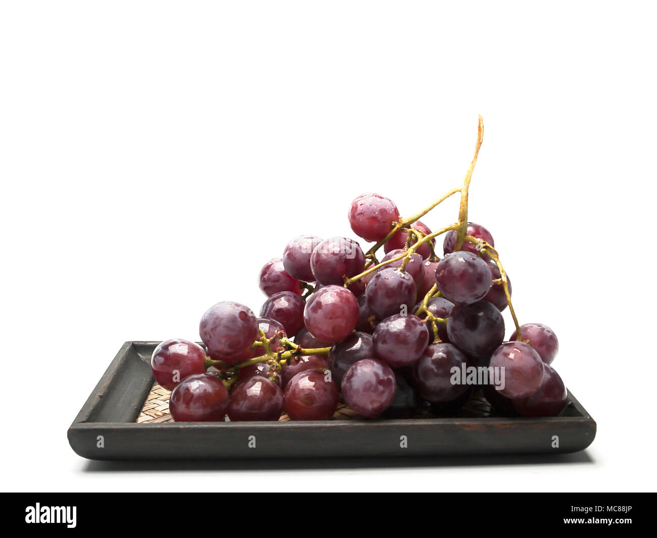 Fruit, red grapes , White background Stock Photo - Alamy