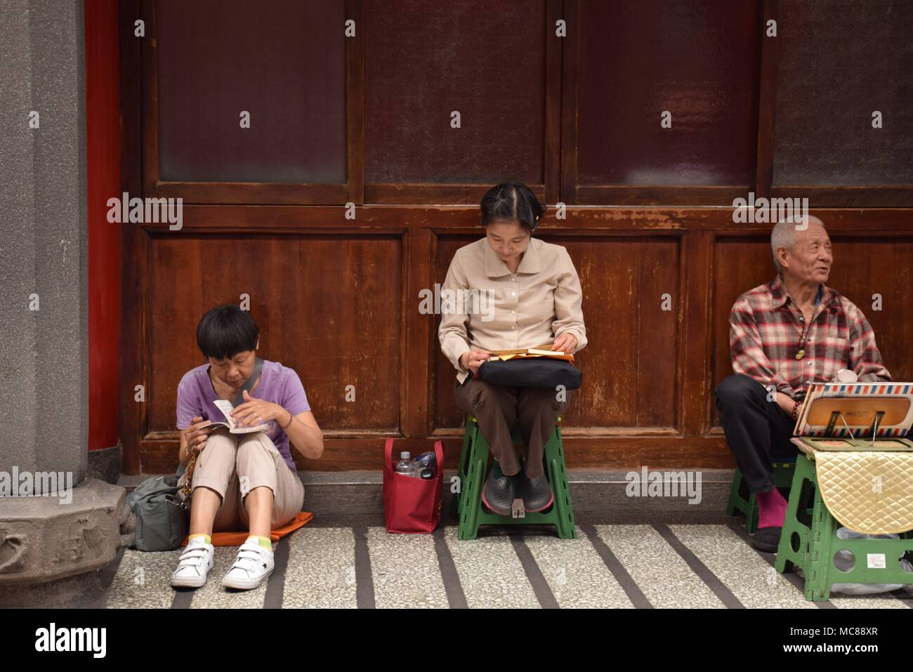Asian people inside Longshan buddhist temple in Taipei, Taiwan Stock ...