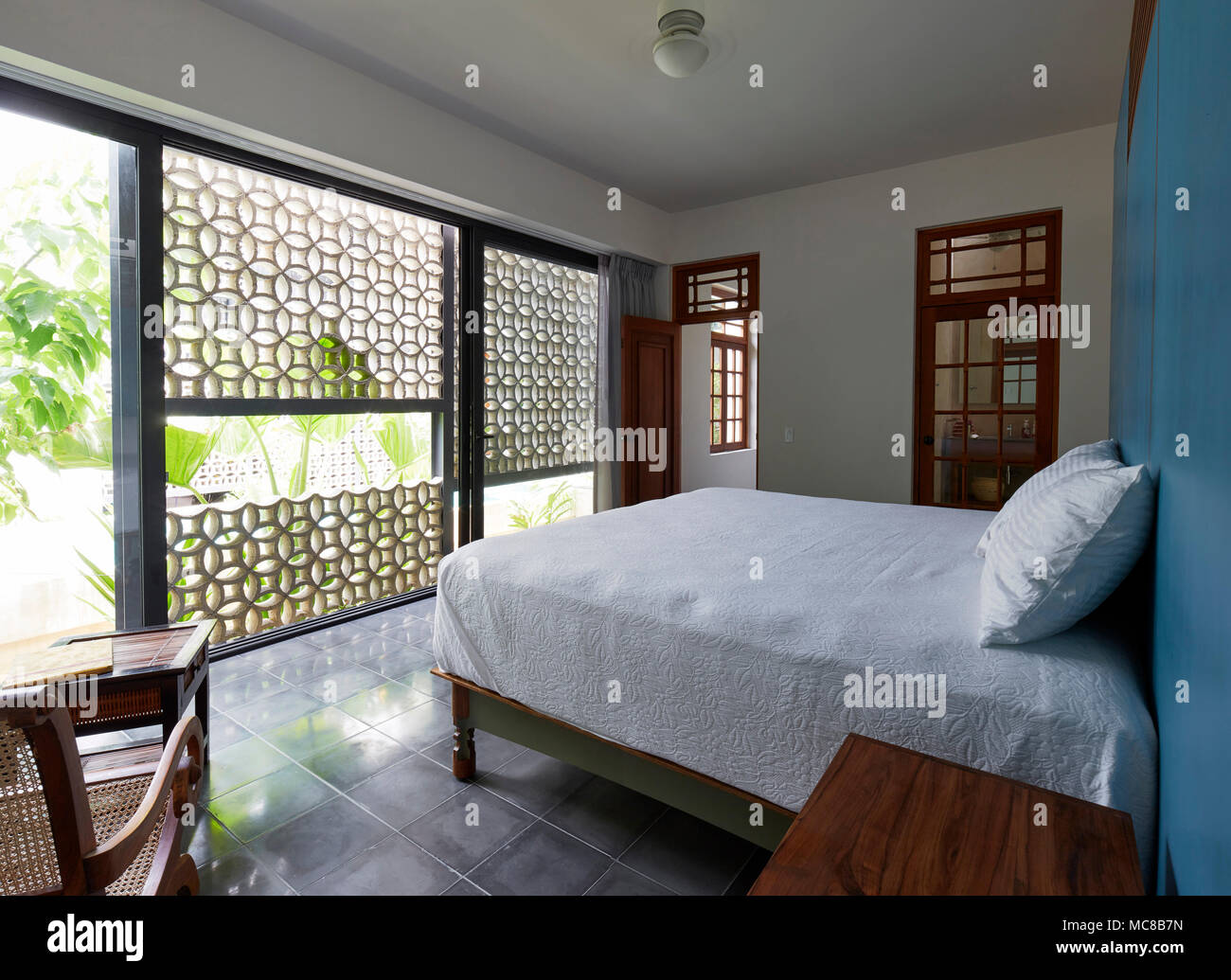 Master bedroom. Merida House 2, Merida, Mexico. Architect: Reyes Rios ...