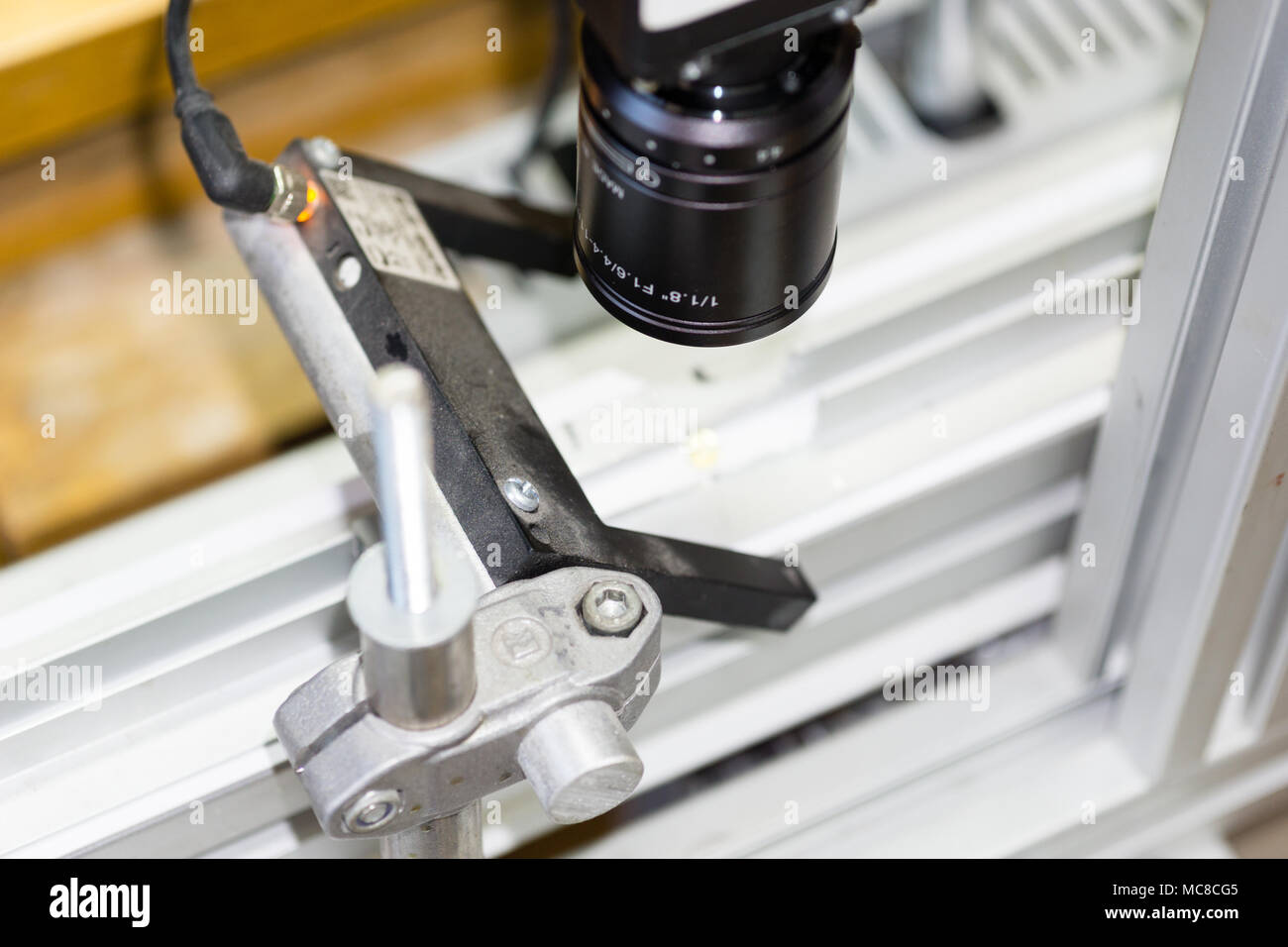 Robotic machine vision system in factory. industry 4.0. Camera lens and ...