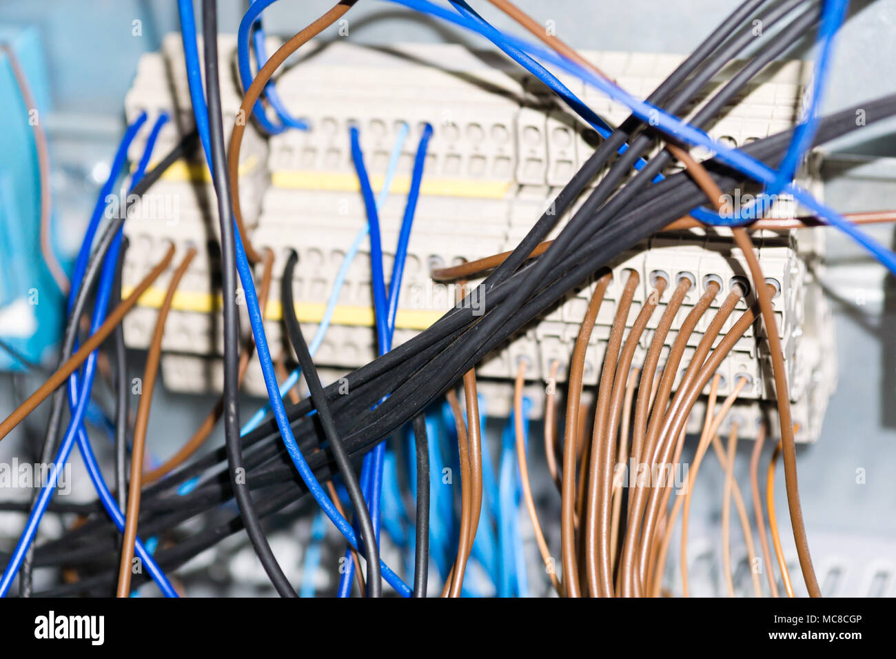 Electrical equipment components installation in fuse box. Wiring and ...