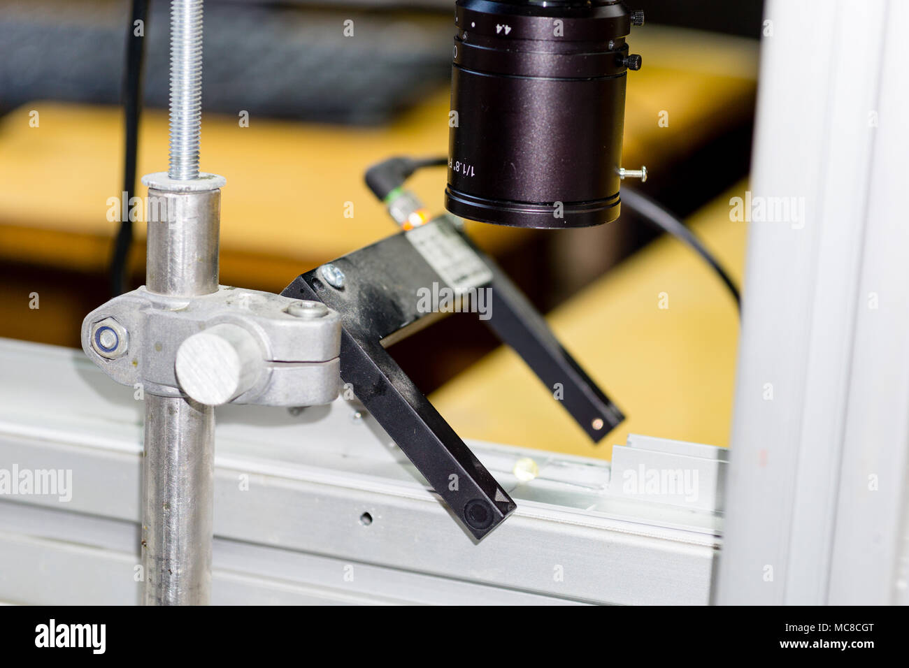 Robotic machine vision system in factory. industry 4.0. Camera lens and ...