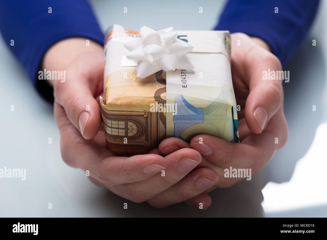 Hand woman taking wrapped hi-res stock photography and images - Alamy