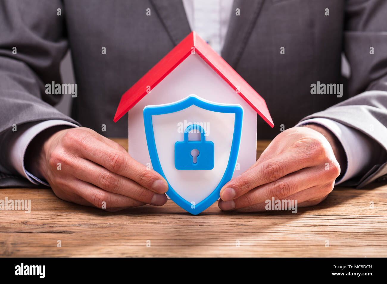 Holding shield hi-res stock photography and images - Alamy