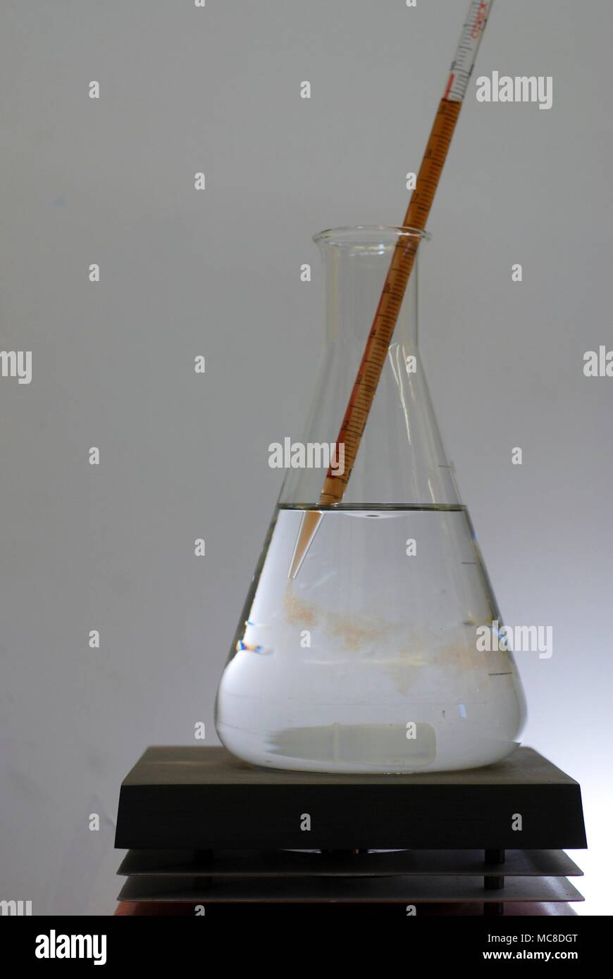 Sampling chemical compounds from a beaker with a pipette Stock Photo ...