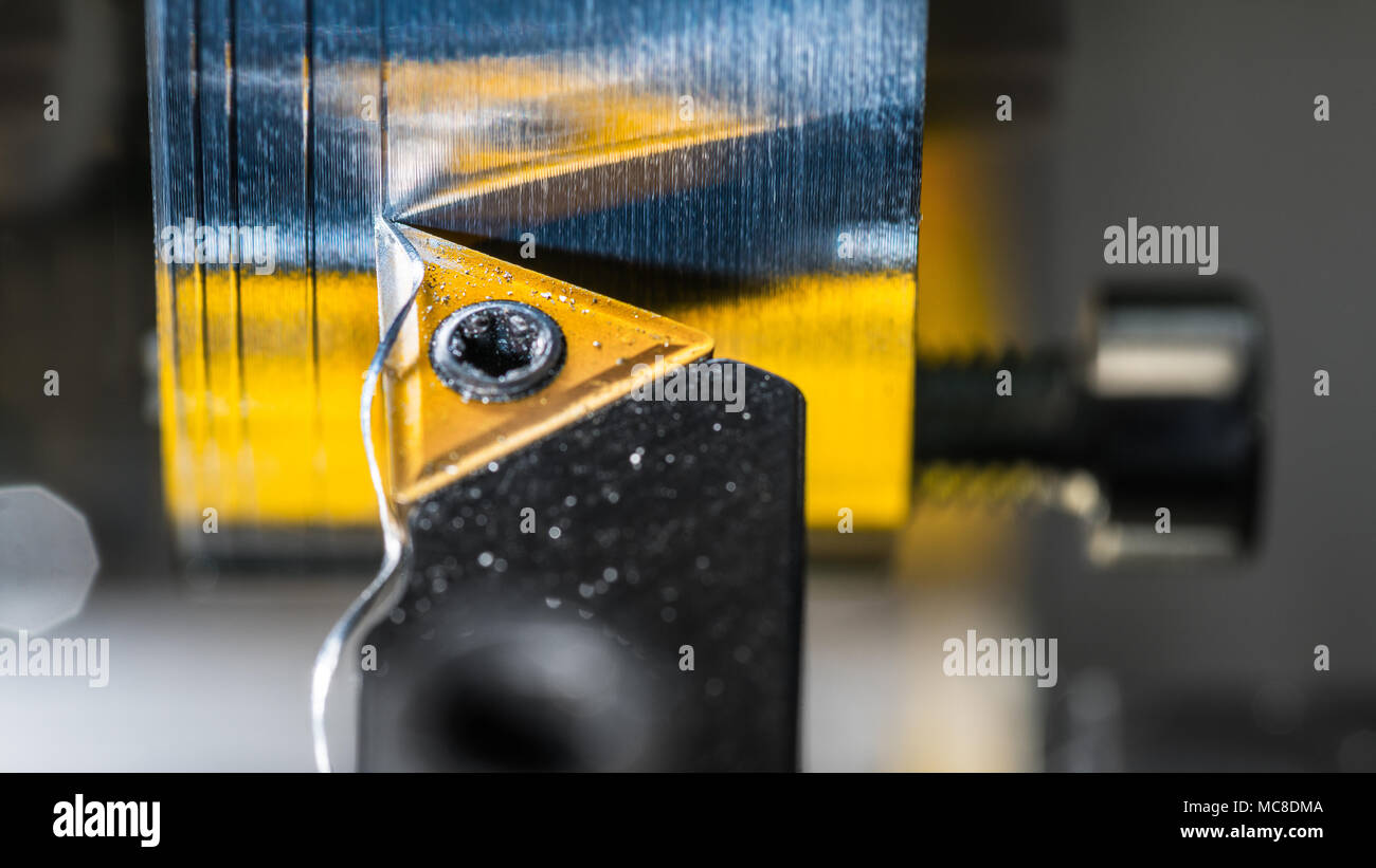 Tool bit detail when machining on lathe. Beautiful industrial ...