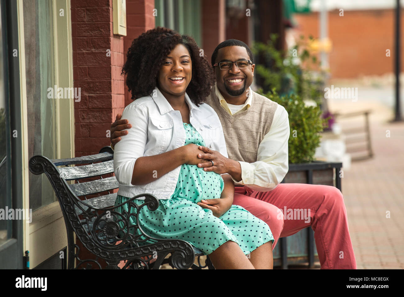 Loving African American couple expecting their first child Stock Photo ...