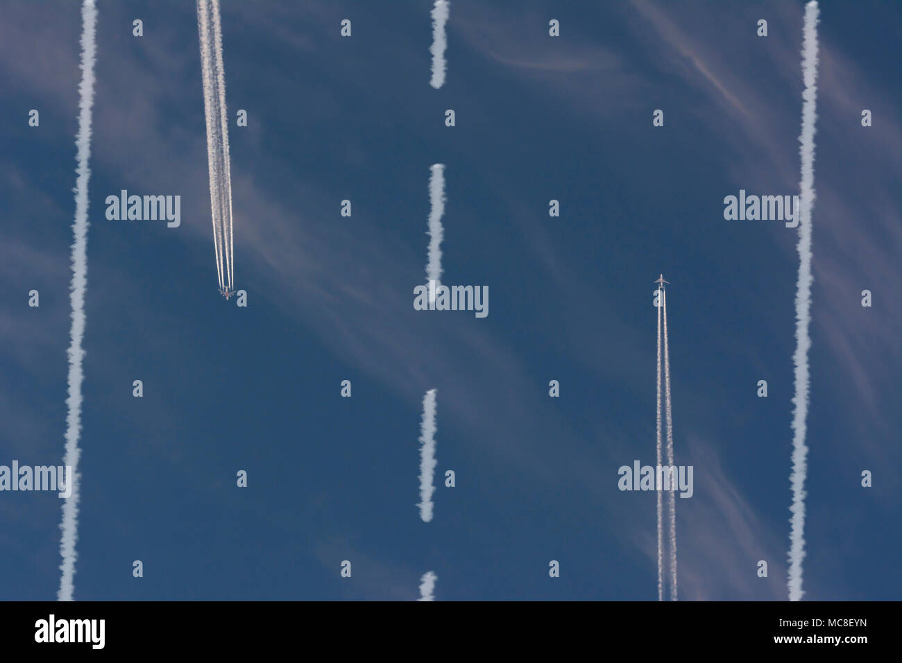 Planes on the sky highway Trail left by a jet plane on a blue sky ...