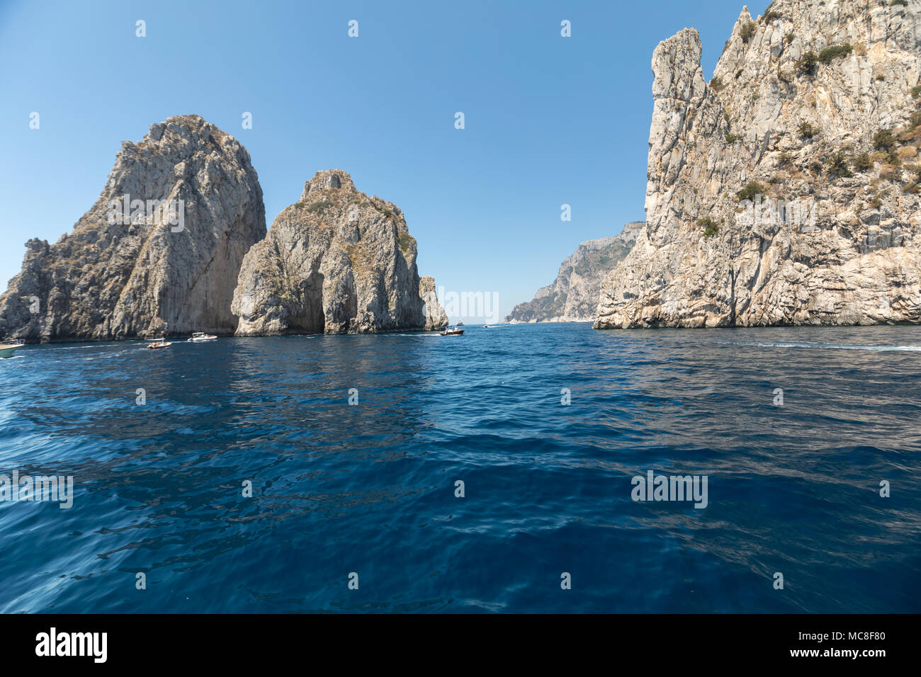 View from the boat on the Faraglioni Rocks on Capri Island, Italy Stock ...