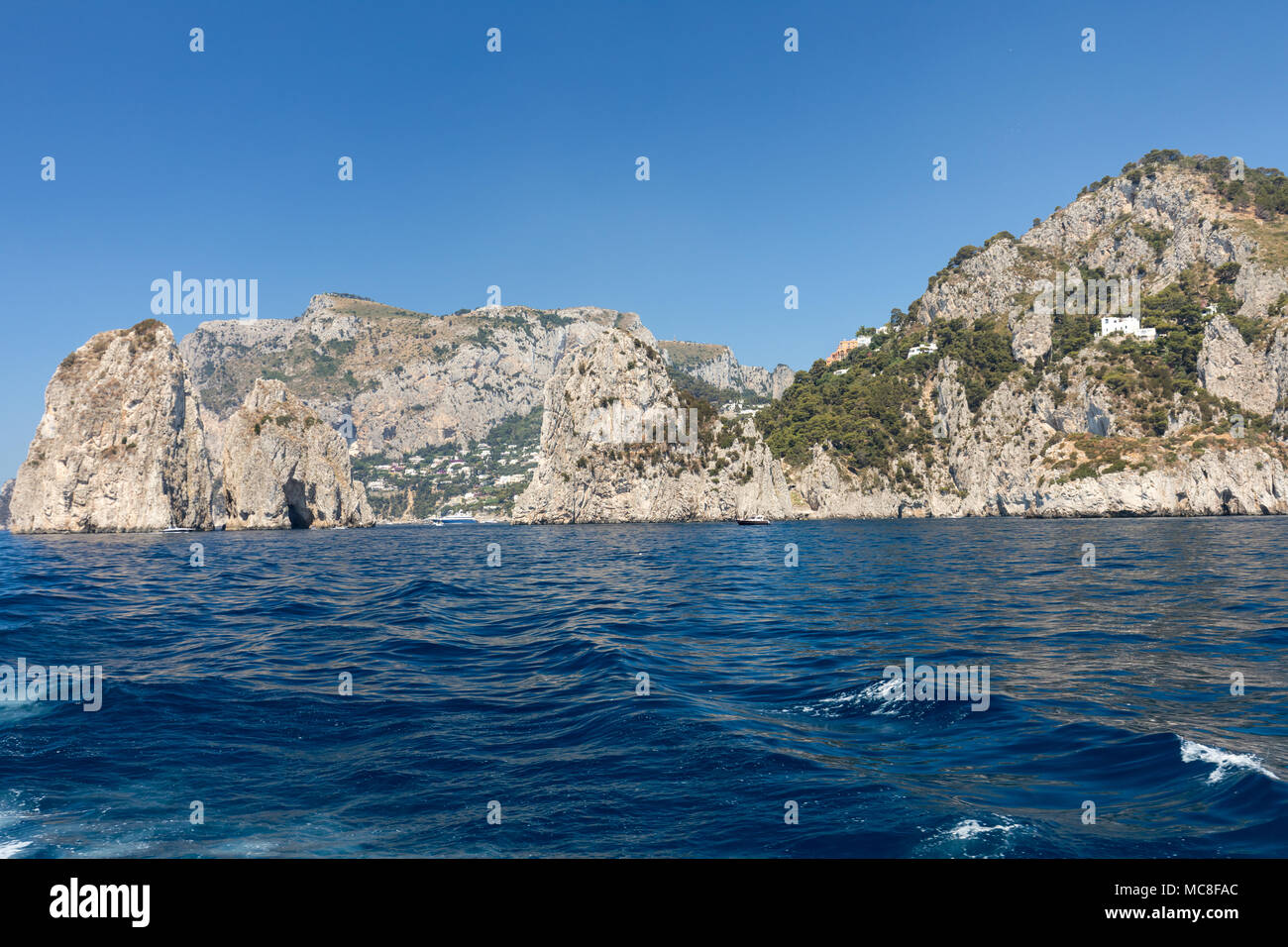 View from the boat on the cliff coast of Capri Island. Italy Stock ...